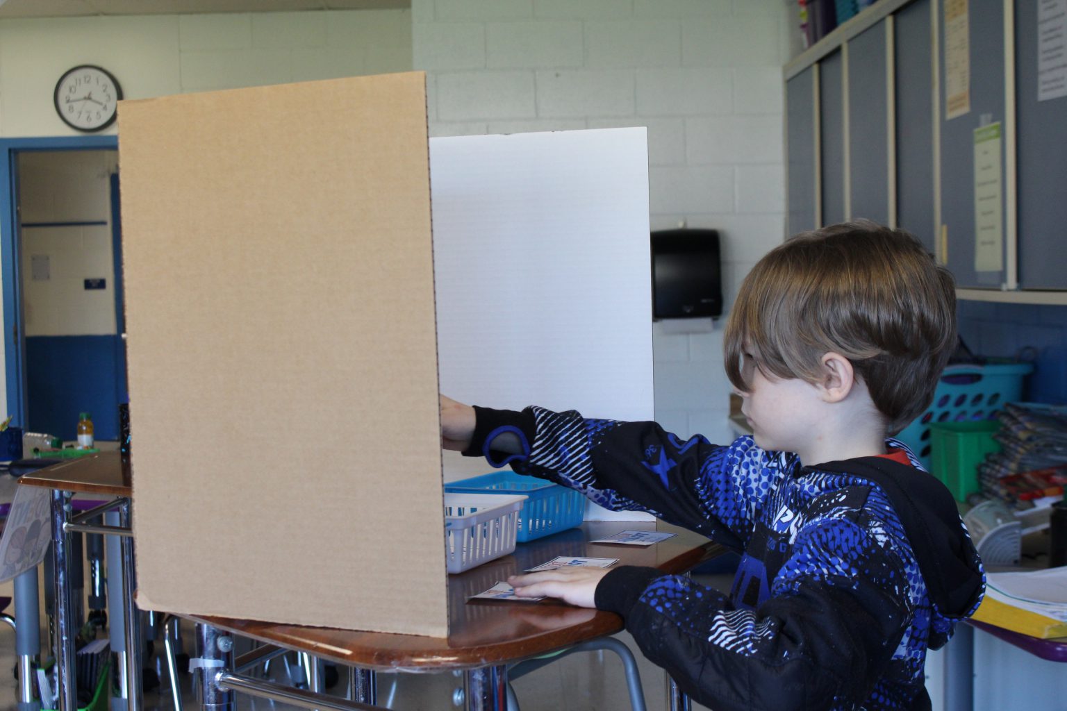 Second-grade students learn about voting with snack election ...